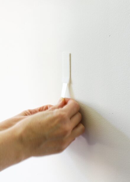 How to Remove Command Strips (Without Damaging Your Walls!) - The Homes ...