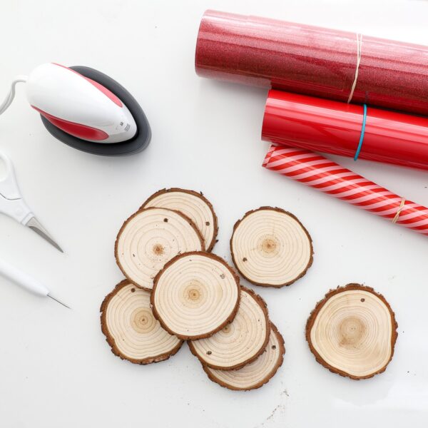 Easy Wood Slice Ornaments with a Cricut & Iron-On - The Homes I Have Made