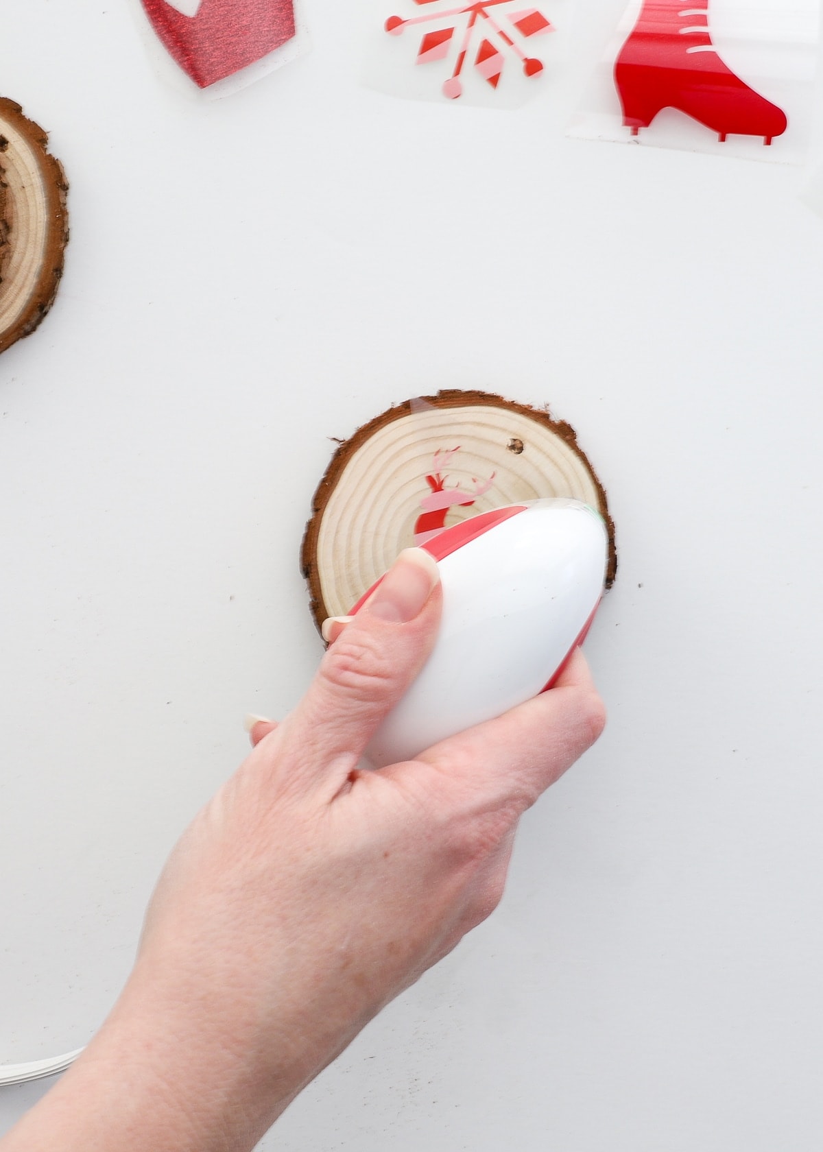 Easy Wood Slice Ornaments with a Cricut & Iron-On - The Homes I Have Made