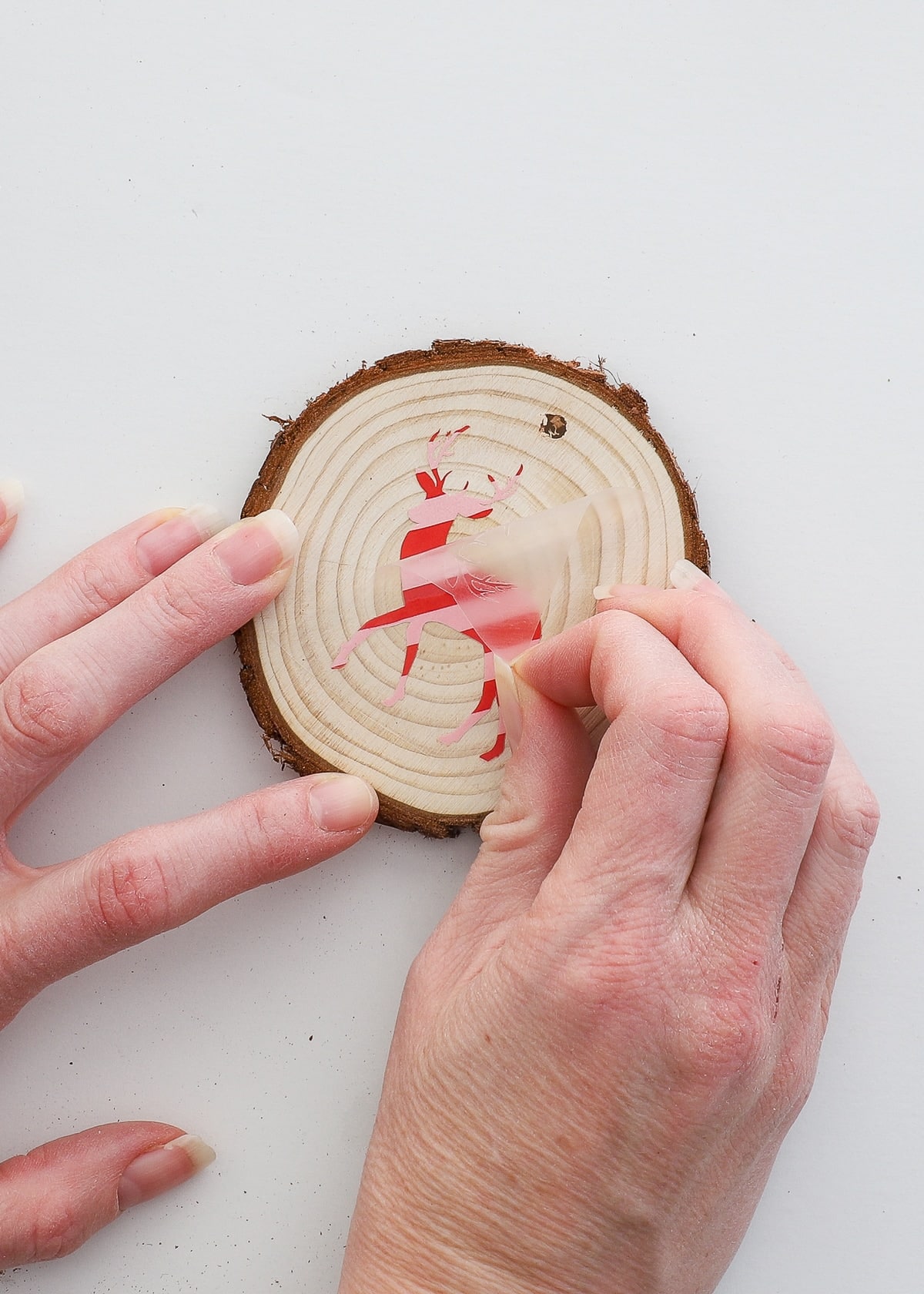 Easy Wood Slice Ornaments with a Cricut & Iron-On - The Homes I Have Made